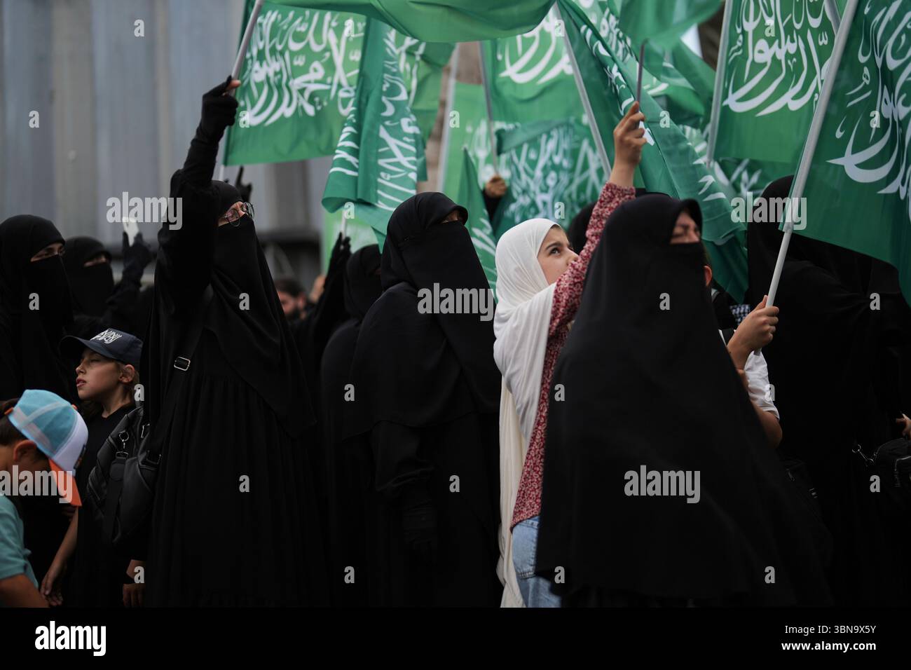 People shout slogans during a protest against satirical LeMan magazine ...