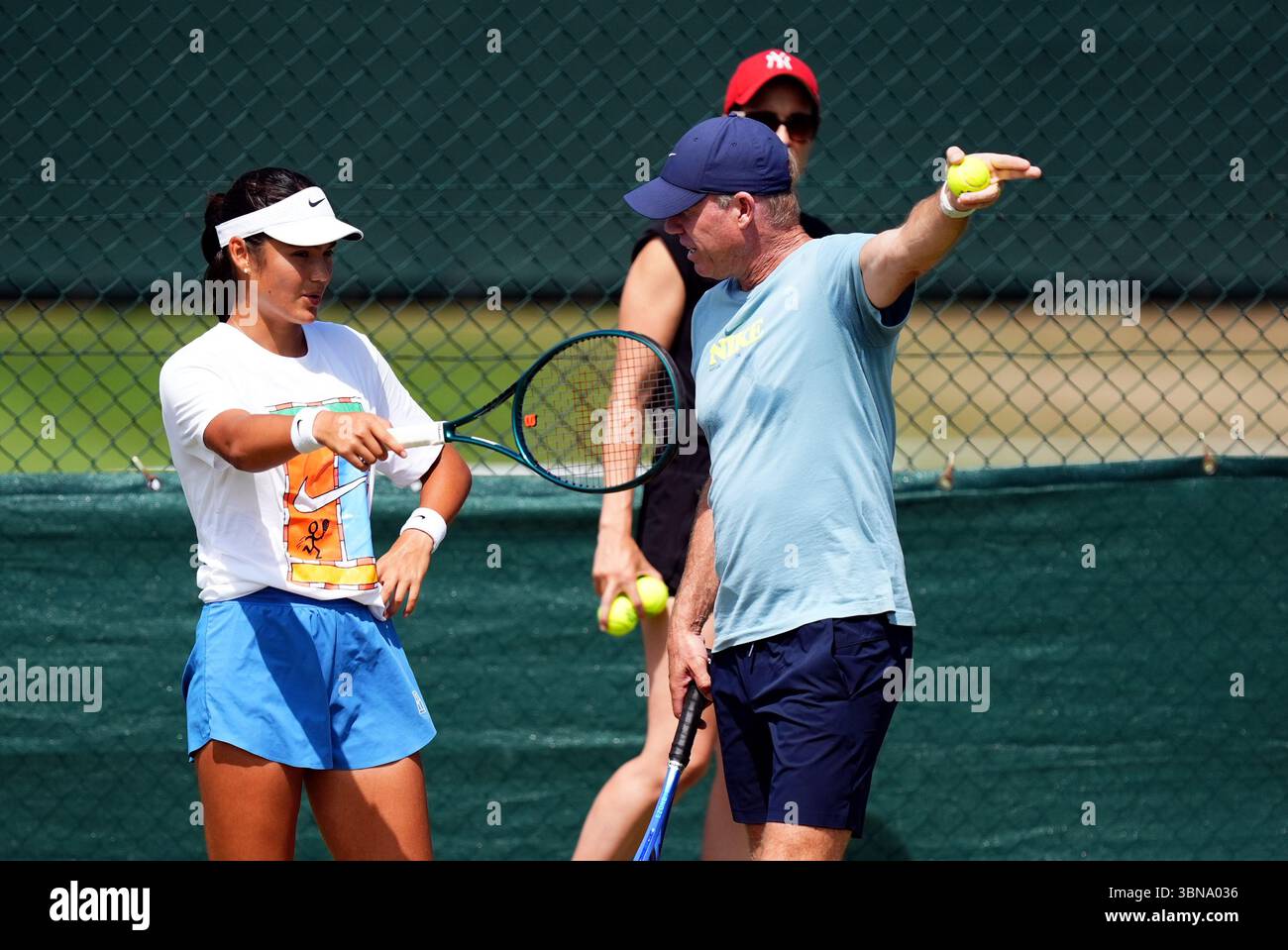 Emma Raducanu with coach Mark Petchey during a practice session on day ...