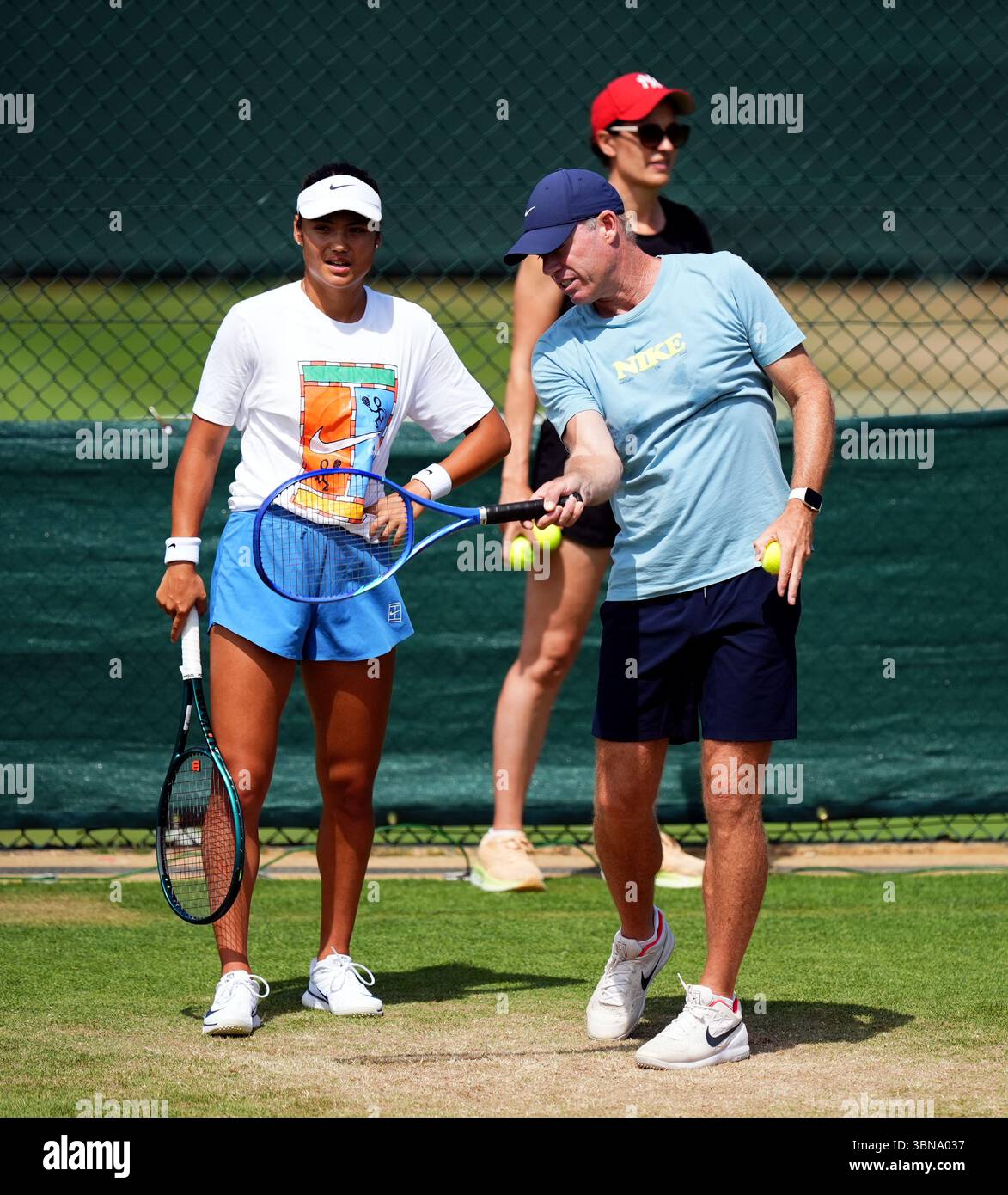 Emma Raducanu with coach Mark Petchey during a practice session on day ...
