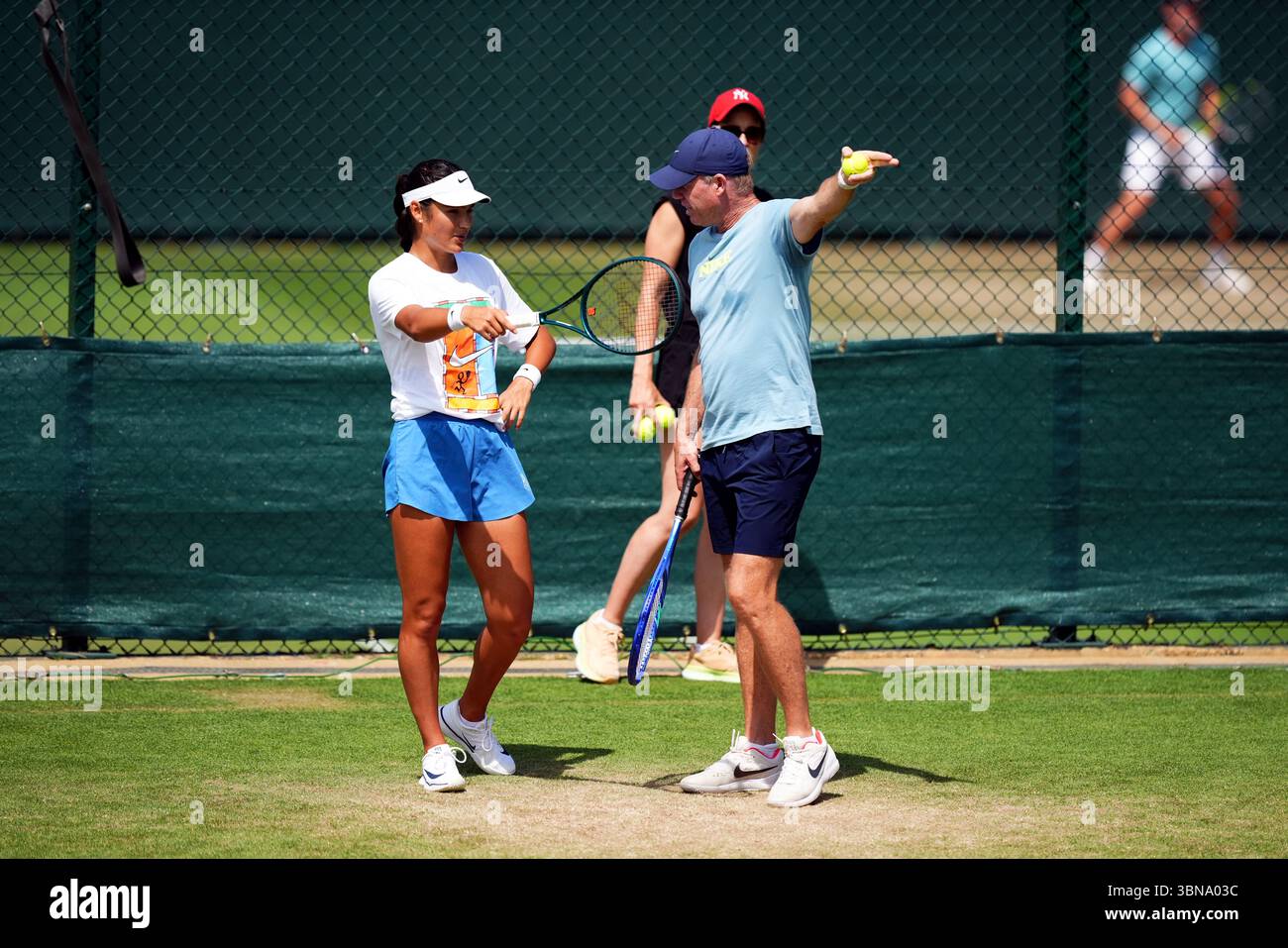 Emma Raducanu with coach Mark Petchey during a practice session on day ...