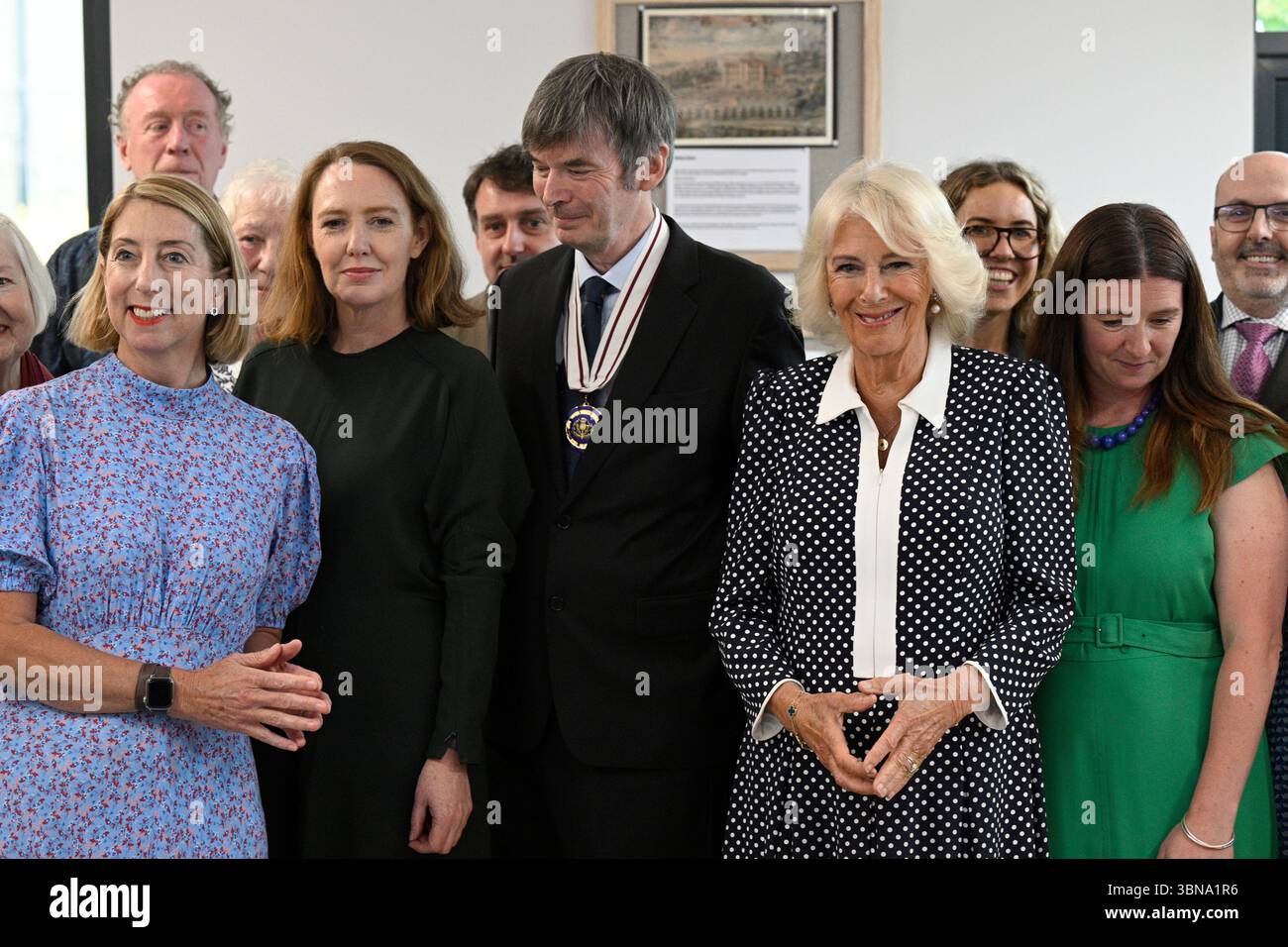 Queen Camilla (centre right) officially opens Ratho Library in ...