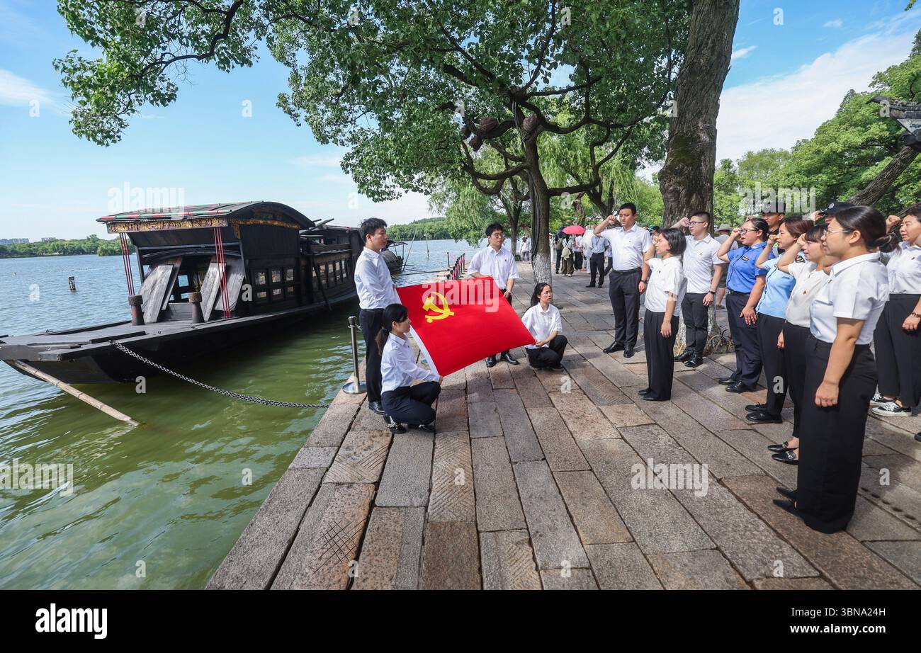(250701) -- BEIJING, July 1, 2025 (Xinhua) -- Members of Communist Party of China (CPC) review ...