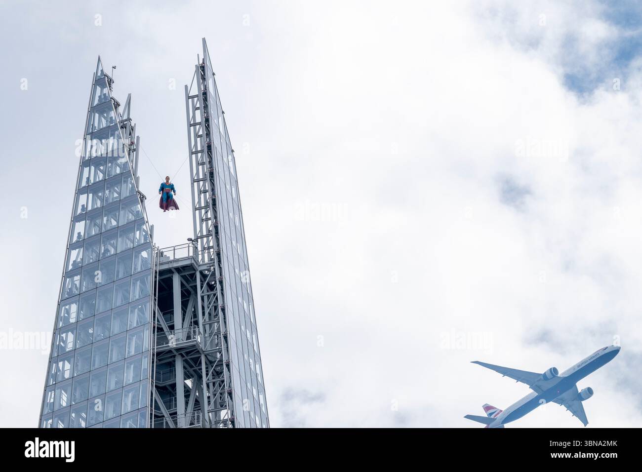 London, UK. 1 July 2025. An aircraft passes as a life-like 11ft tall ...
