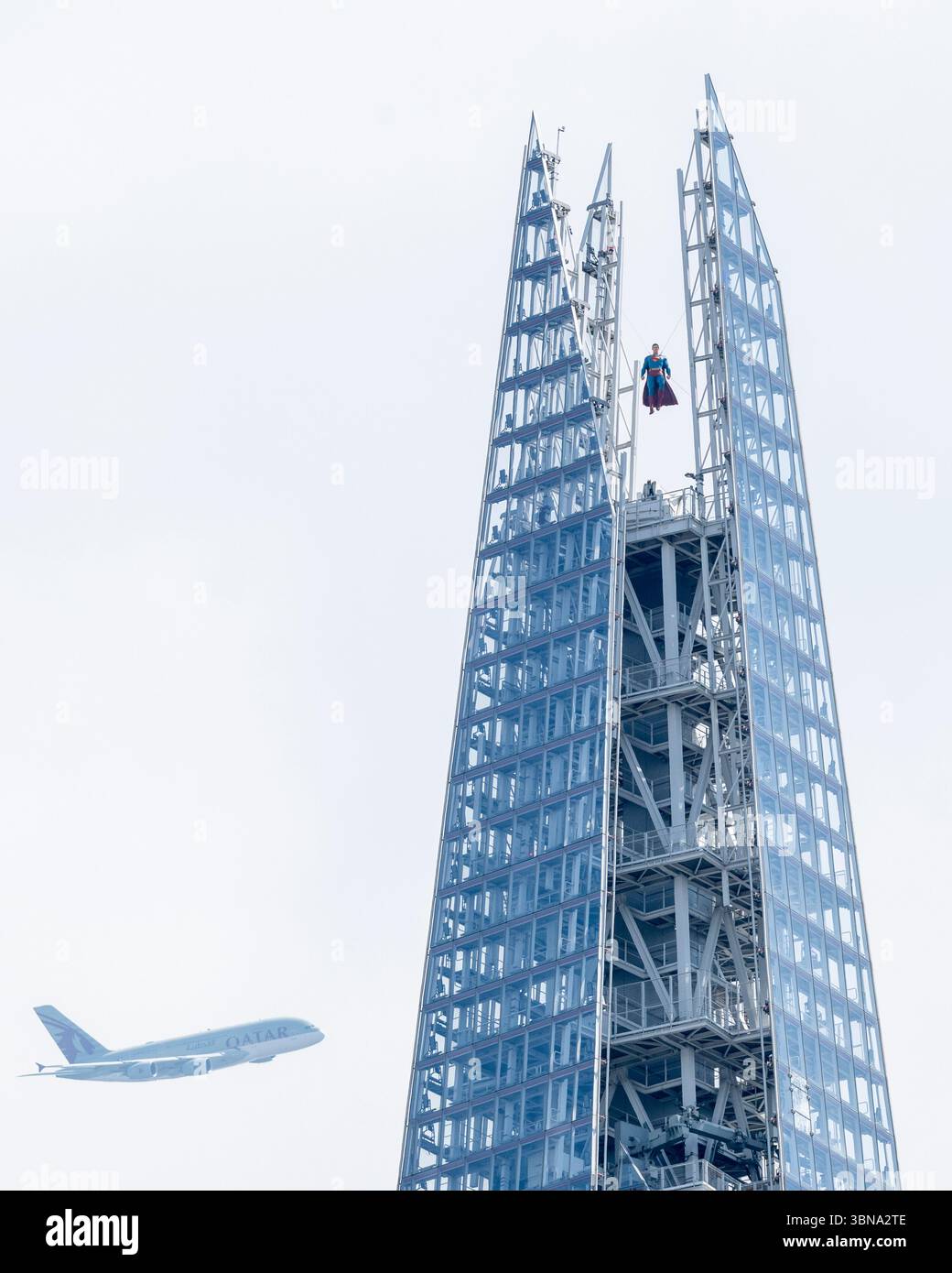 London, UK. 1 July 2025. An aircraft passes as a life-like 11ft tall ...
