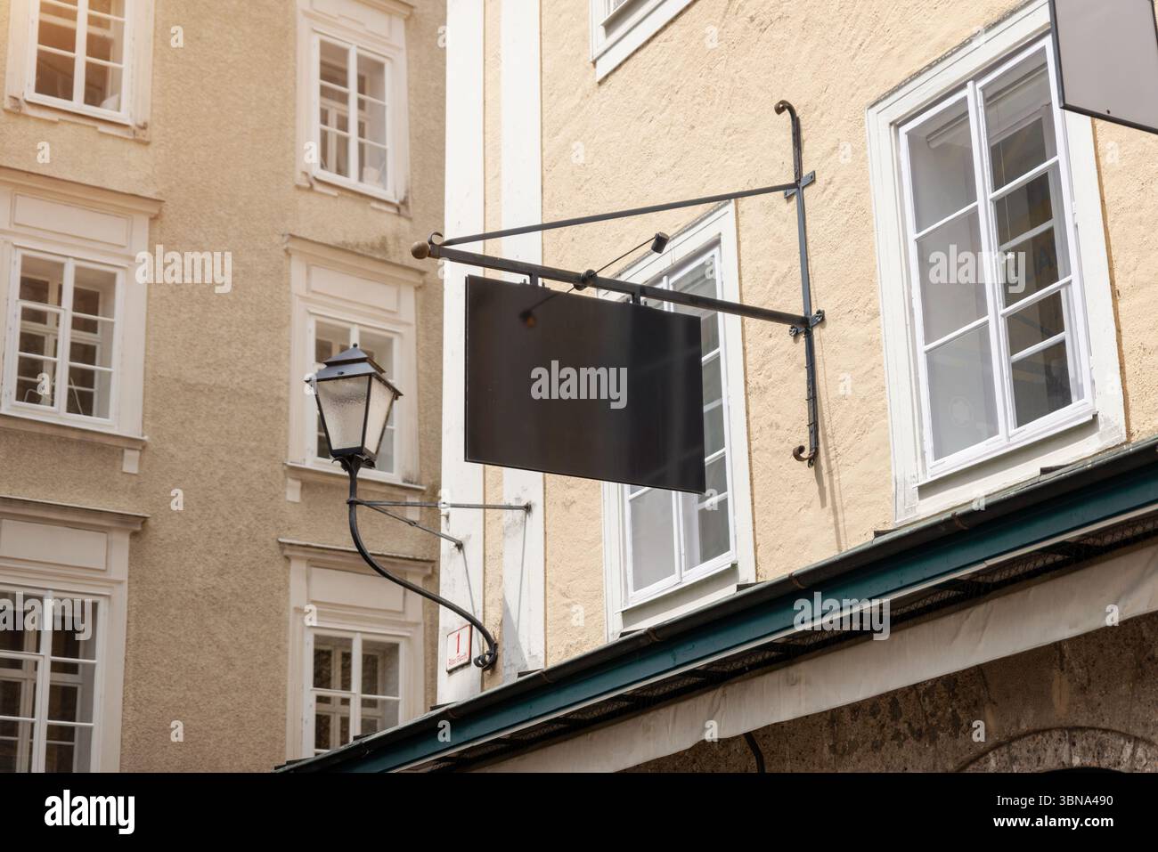 Modern blank rectangular signage mounted on rods, ideal for ...