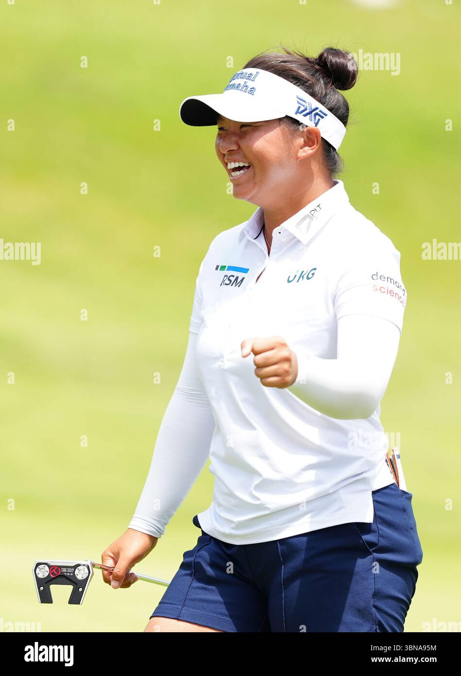 MIDLAND, MI - JUNE 29: LPGA golfer Megan Khang reacts to making a birdie putt on the 4th hole ...