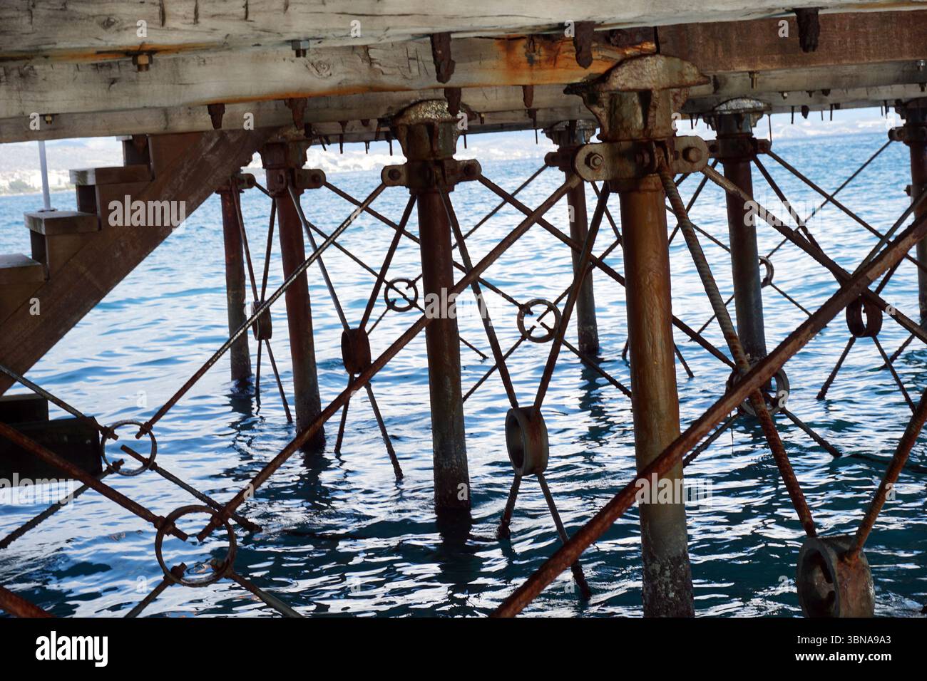 Limassol, Cyprus, A wooden pier extending over a body of water. The ...