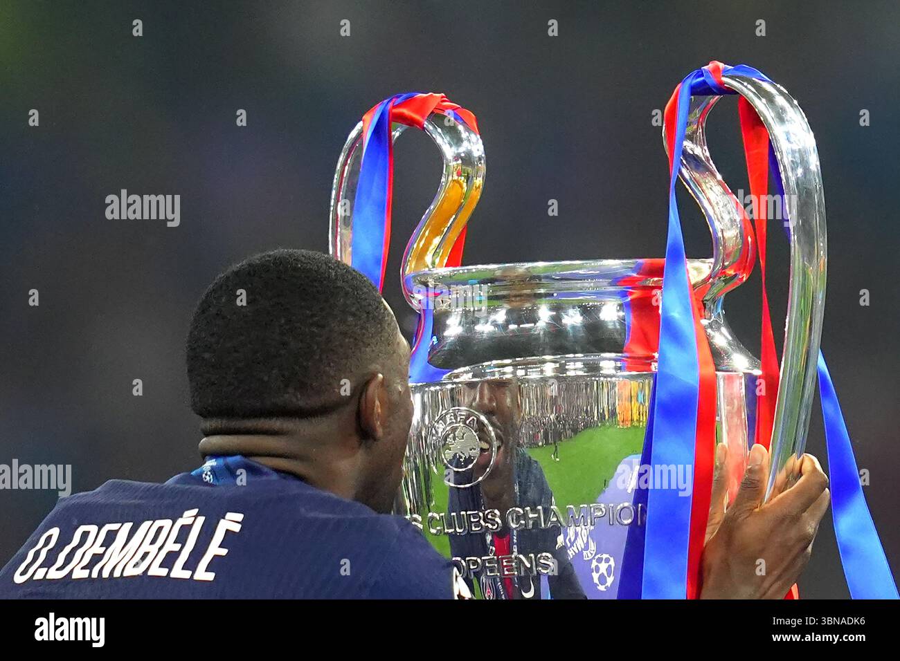 PSG's Ousmane Dembele celebrates winning the trophy after the Uefa ...