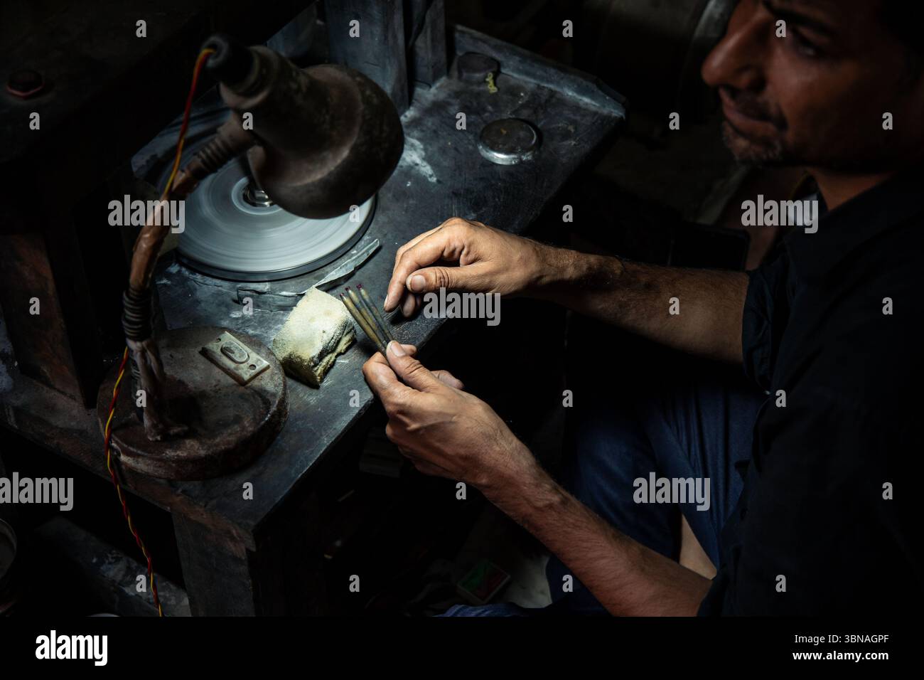 Ancient gem cutter cutting polishing hi-res stock photography and ...