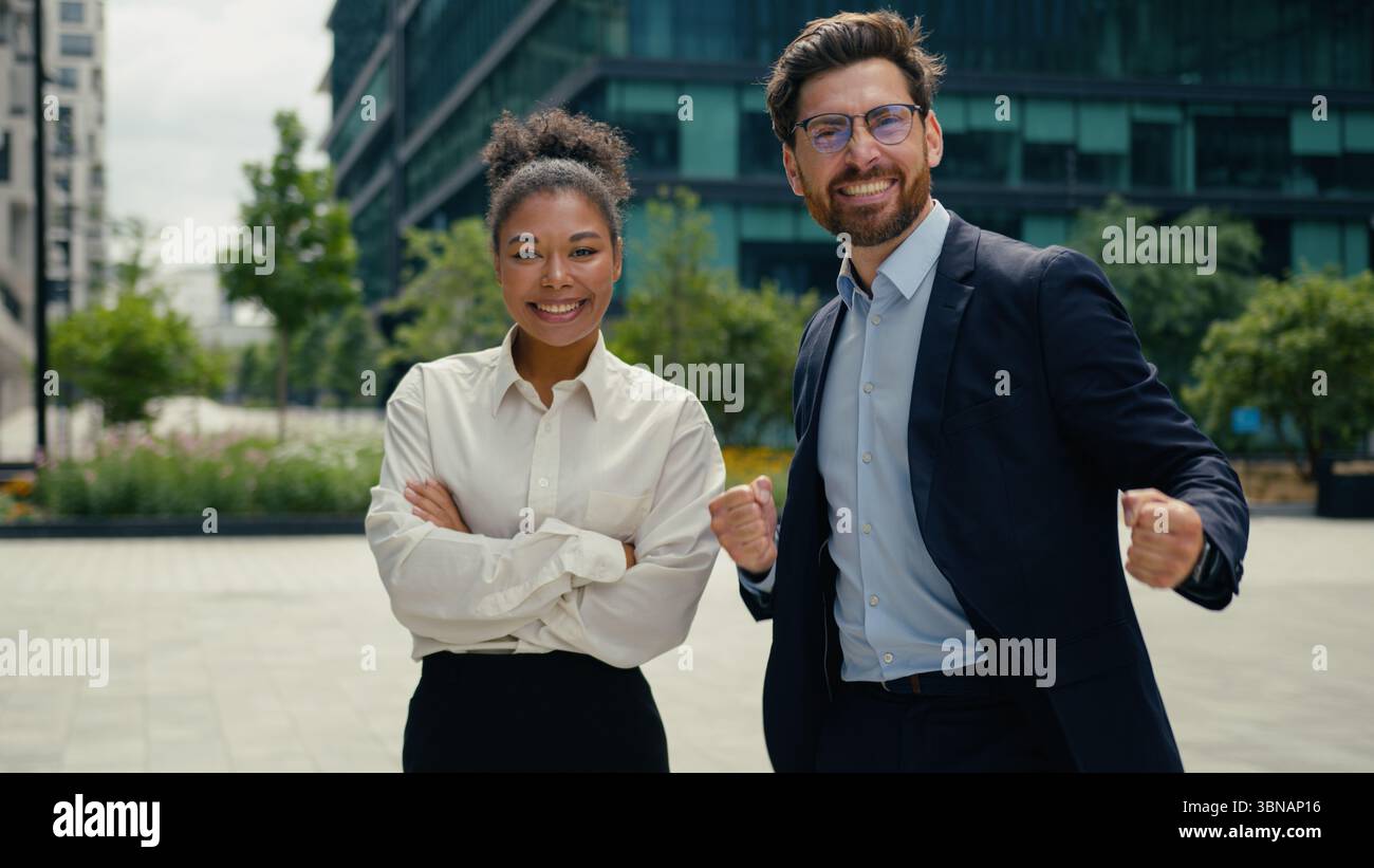 Two multiracial colleagues multiethnic coworkers people Caucasian ...