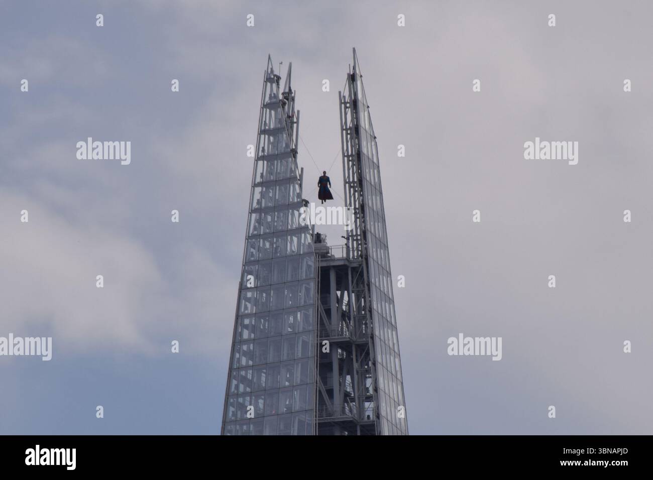London, UK. 1st July 2025. Superman is suspended on top of The Shard ...