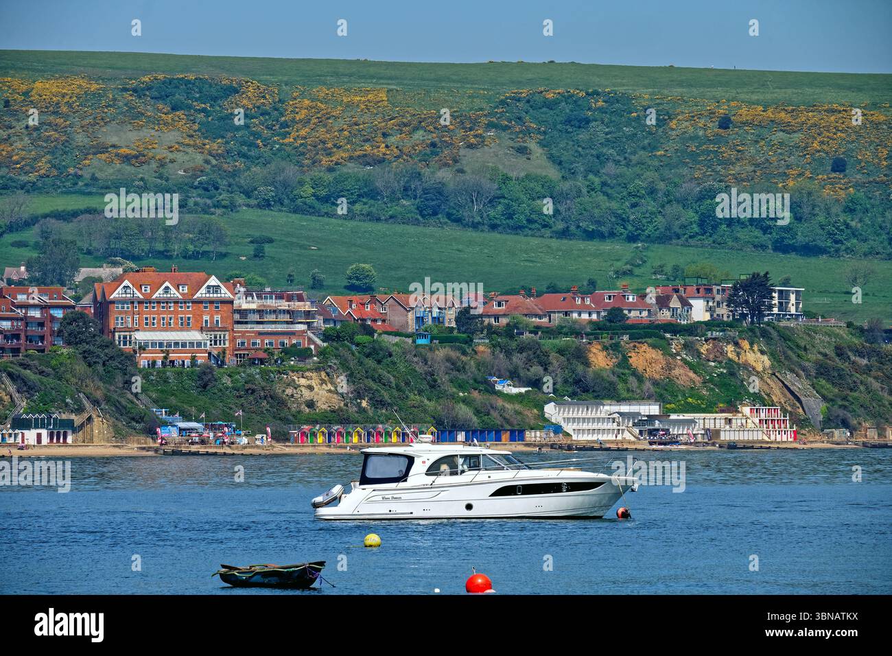 The view across Swanage bay, boats in foreground with the towns ...