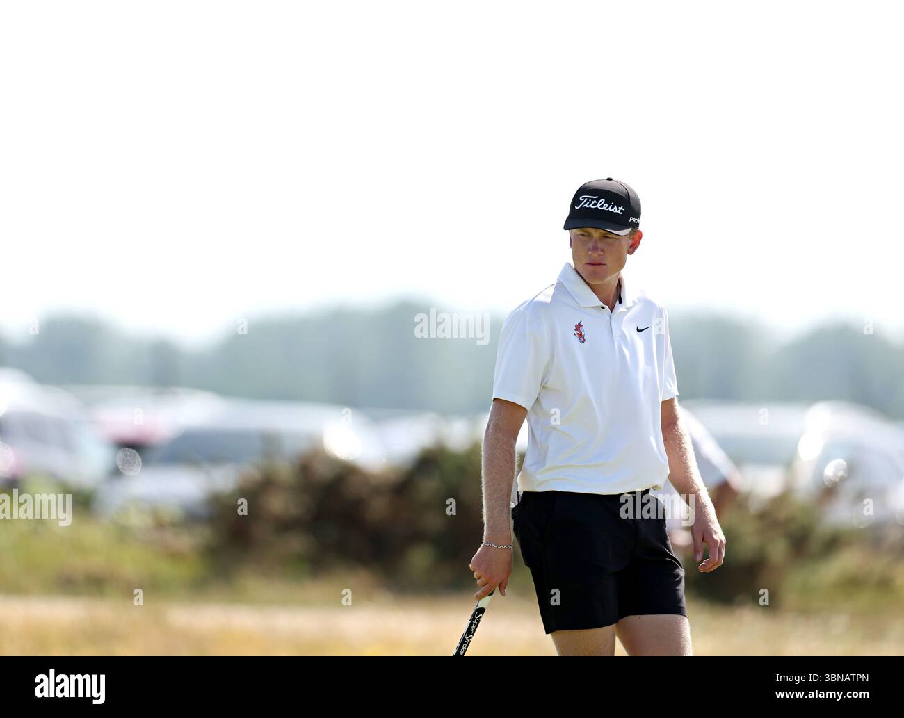 Luke Poulter on the green of the first hole during The Open 2025 The ...