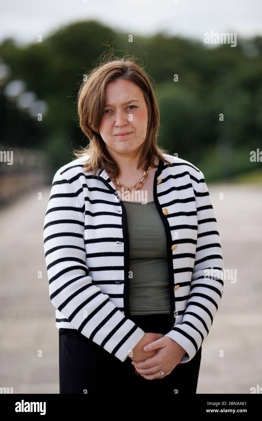 DUP MLA Deborah Erskine poses for a photo outside Parliament Buildings ...