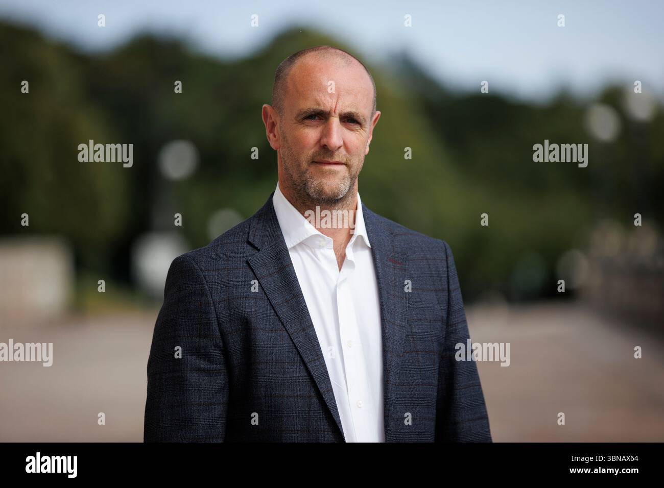 SDLP MLA Mark H Durkan poses for a photo outside Parliament Buildings, Stormont after speaking ...