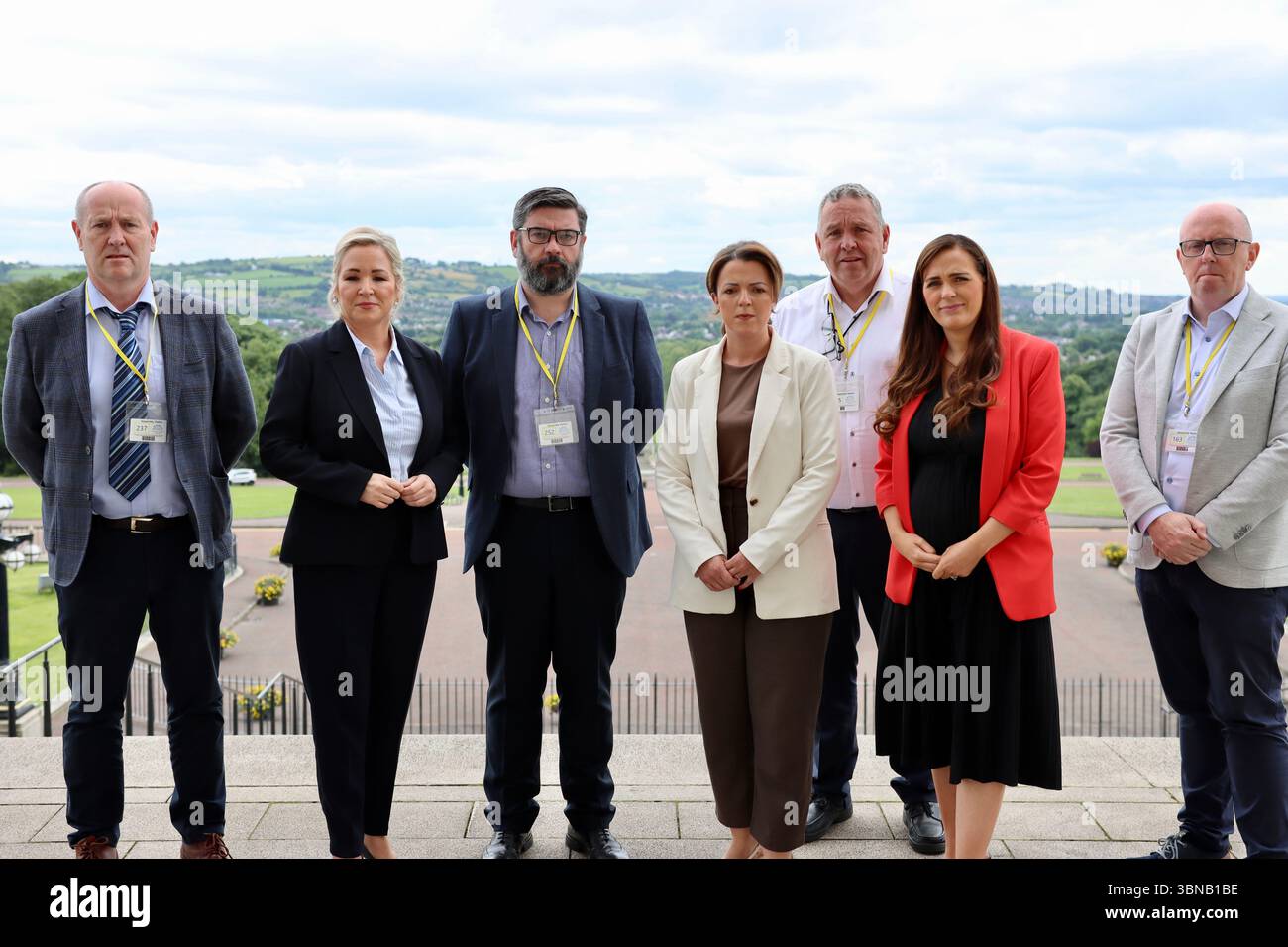Infrastructure Minister Liz Kimmins is joined by (left to right ...