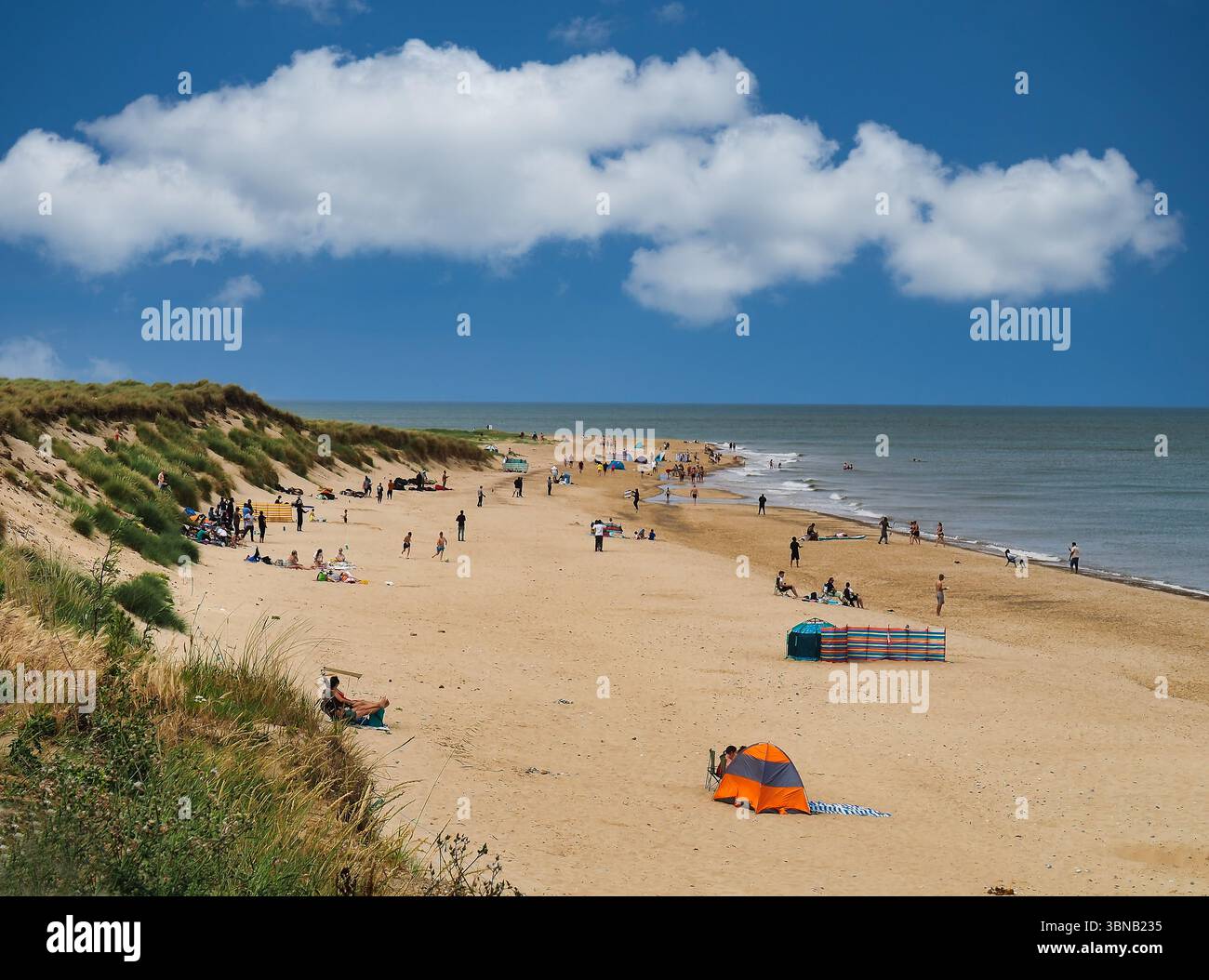People enjoying the beach at Winterton on Sea, Norfolk, East Anglia ...