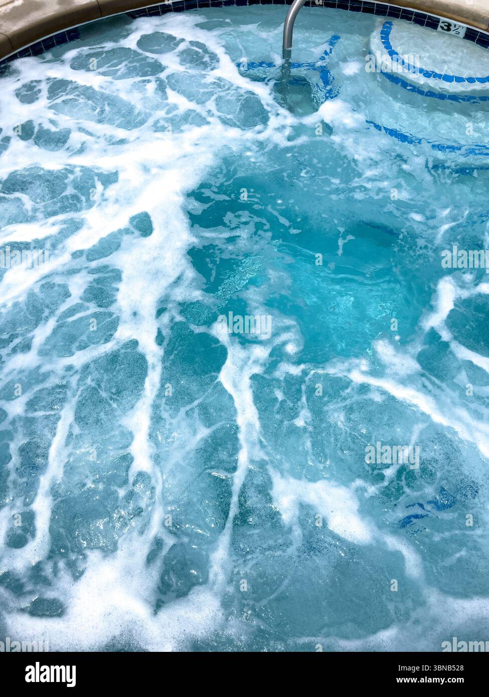 Swirling foam in blue water hi-res stock photography and images - Alamy