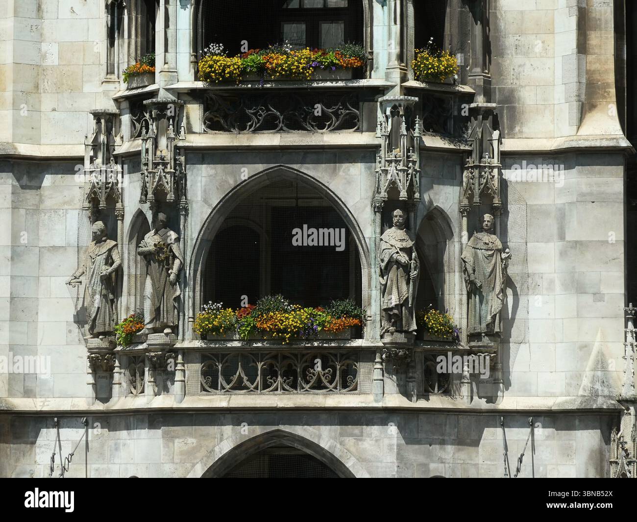 Munich, Marienplatz : detail of the rich gothic architecture of the New ...