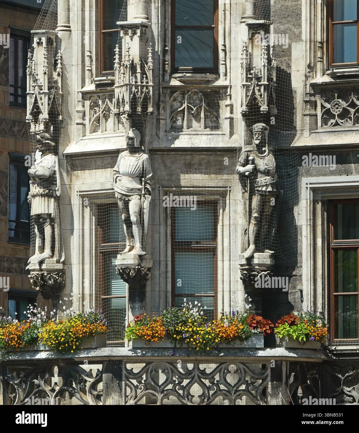 Munich, Marienplatz : detail of the rich gothic architecture of the New ...