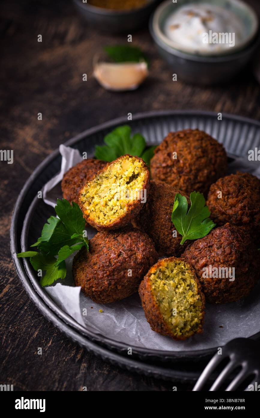 Middle Eastern falafel balls with sauce Stock Photo - Alamy