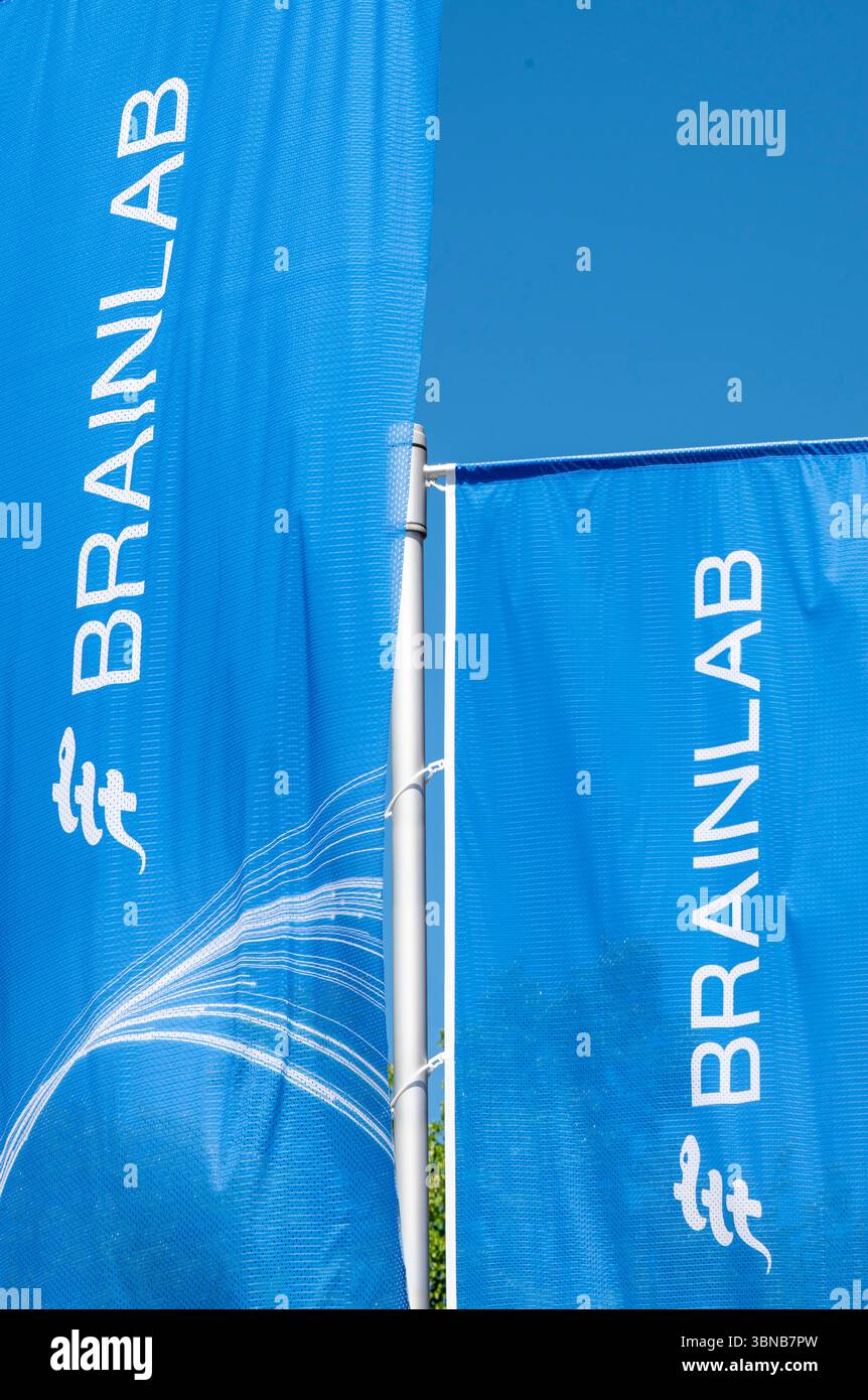 Munich, Germany. 01st July, 2025. A view of the company logo on flags ...