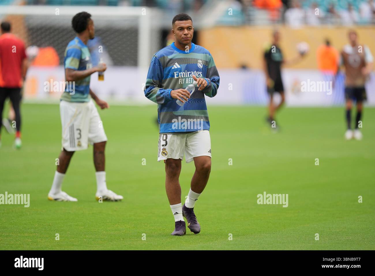 Real Madrid's Kylian Mbappe walks during a warmup for the Club World ...