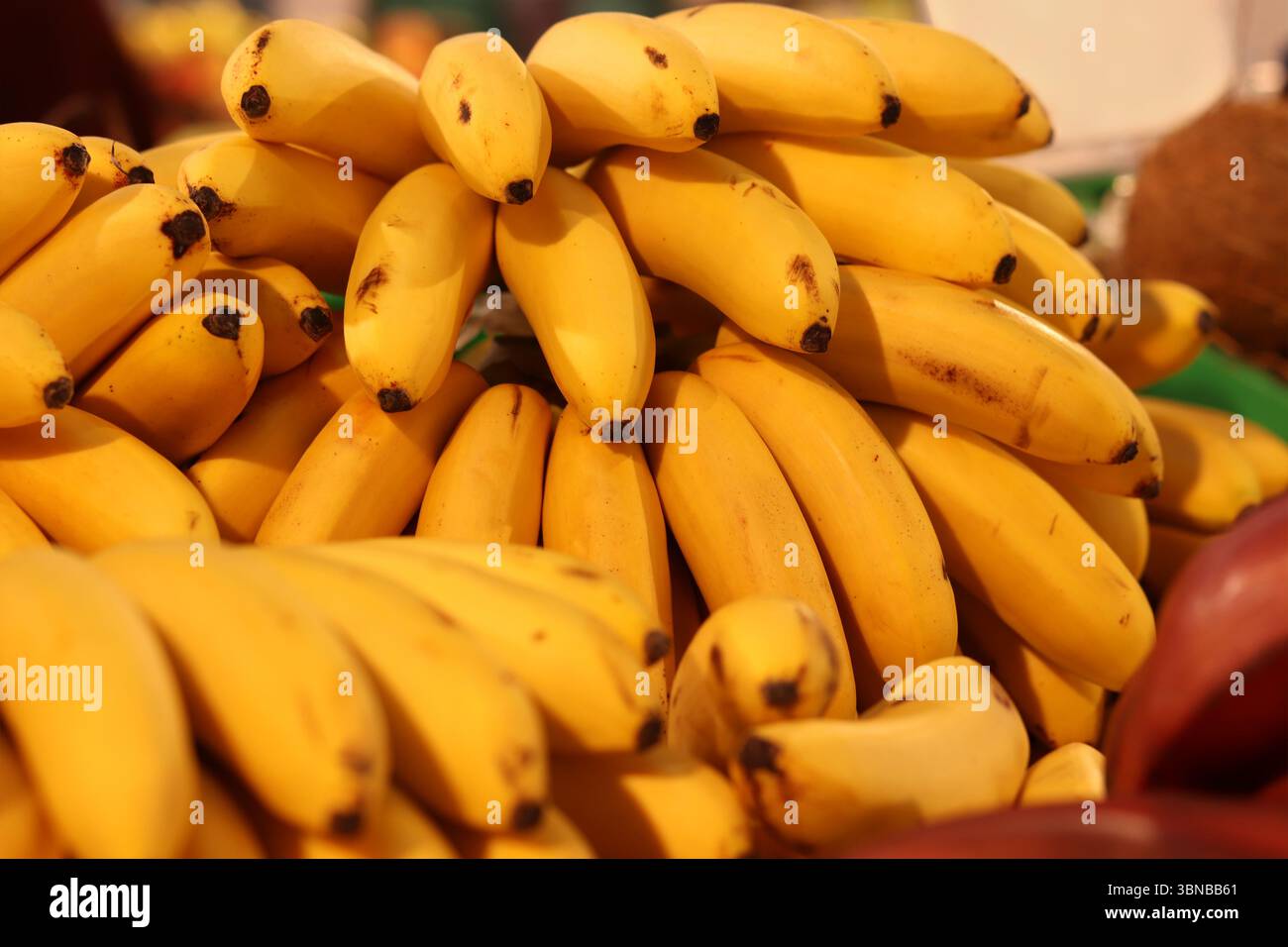 Ripe bananas piled up. Yellow bananas sold in supermarket. Food ...