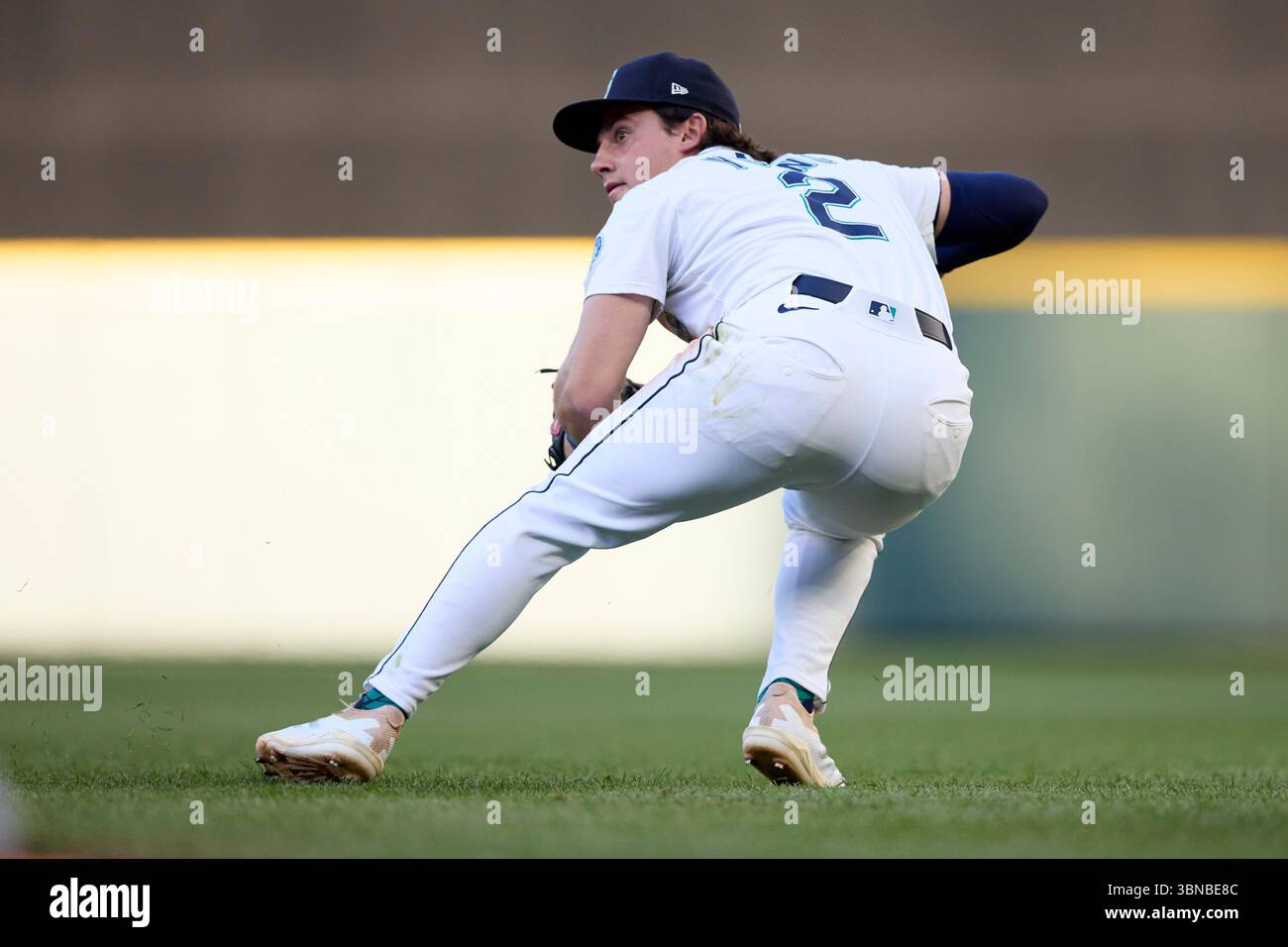 Seattle Mariners second baseman Cole Young fields a ground ball against ...