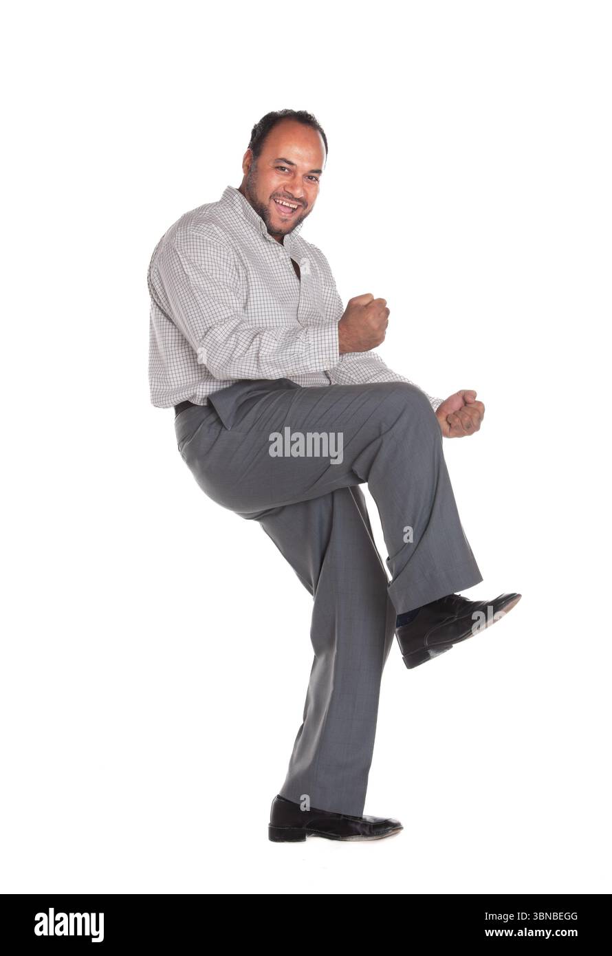 single Arab Egyptian man with a happy face hands fists raised up ...