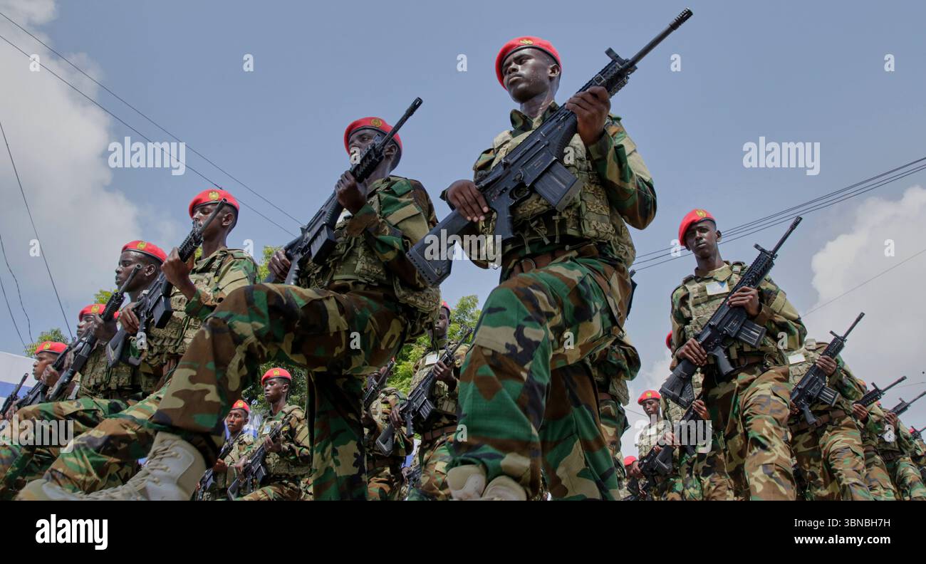 Somali soldiers march during celebrations marking the 65th anniversary ...