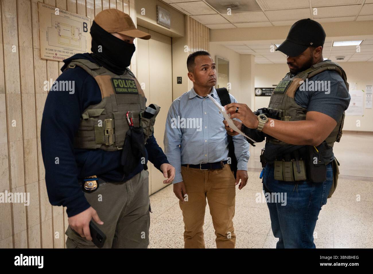 Masked ice agent hi-res stock photography and images - Alamy