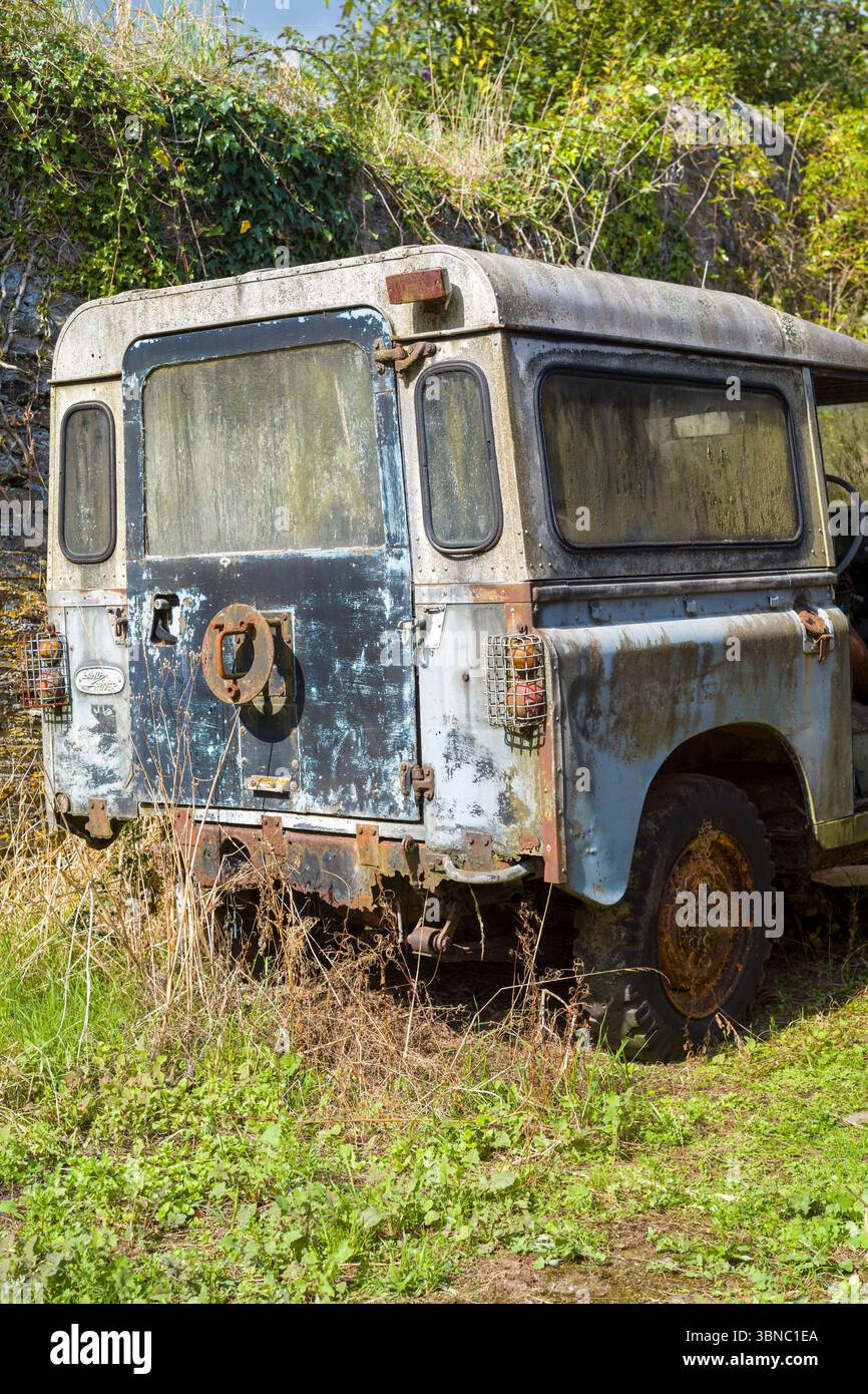 Rusty old weather-beaten British made Land Rover Defender 4x4 four ...