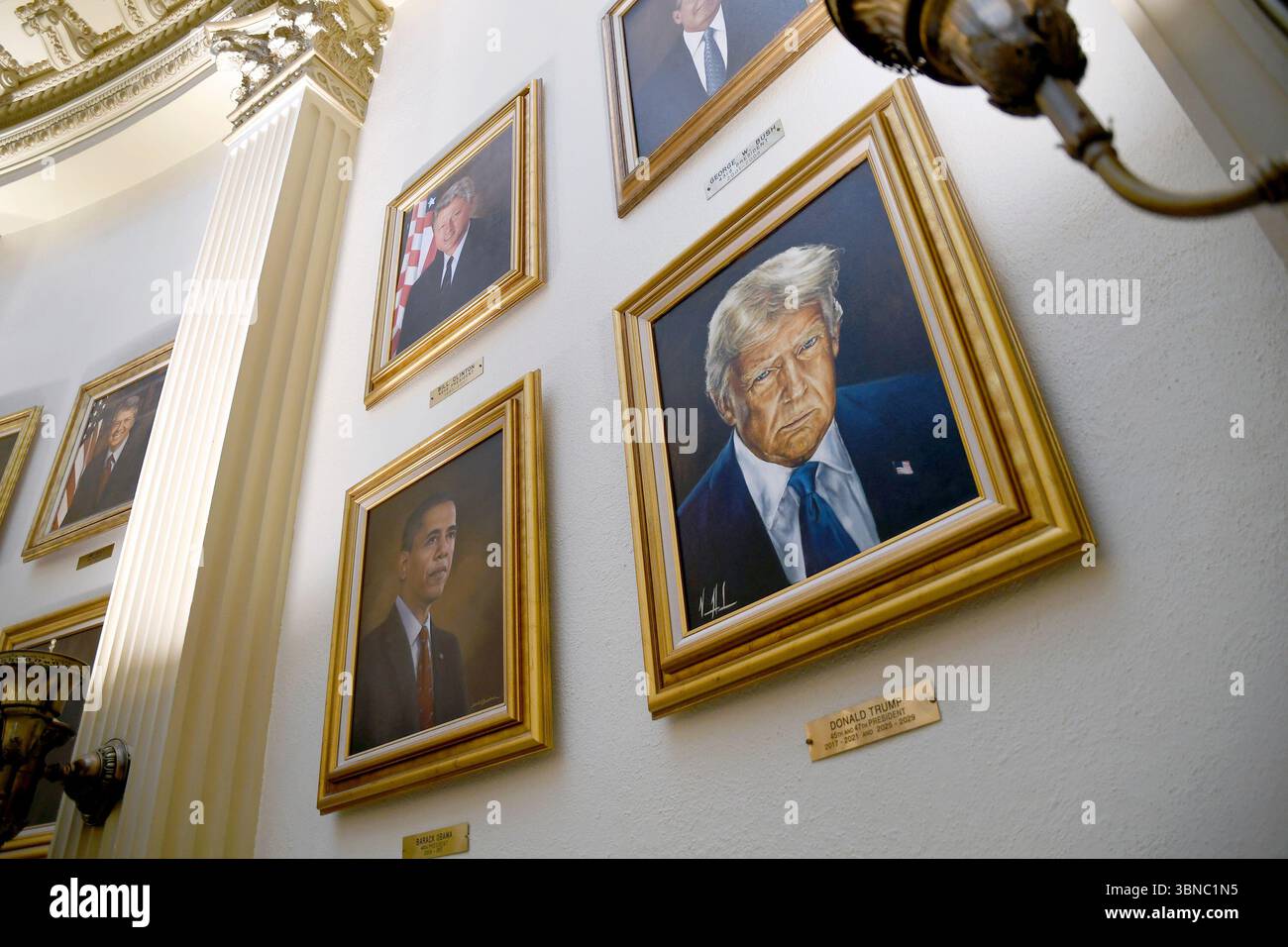 Portraits of President Donald Trump and other presidents hang in the ...