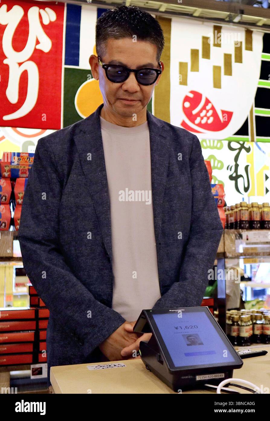 Facial recognition payment system is install even if customers wear ...