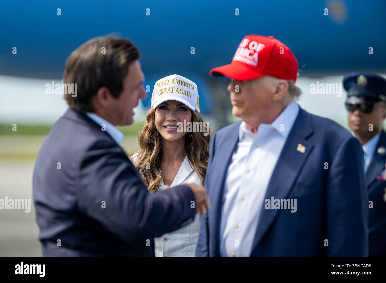 President Donald Trump greets Florida Governor Ron DeSantis (R) and ...