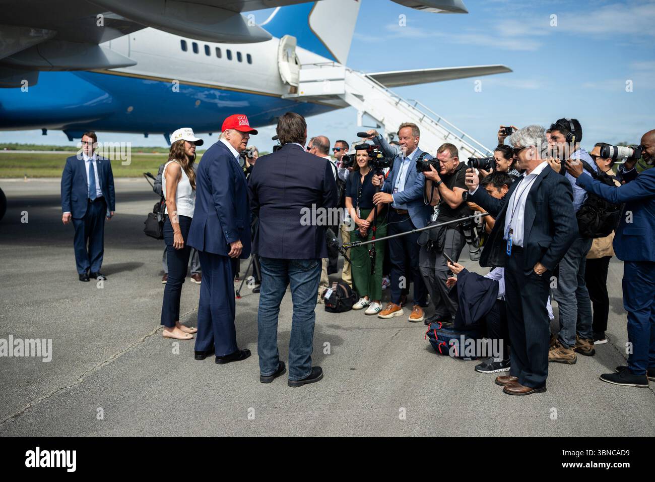 President Donald Trump greets Florida Governor Ron DeSantis (R) and ...