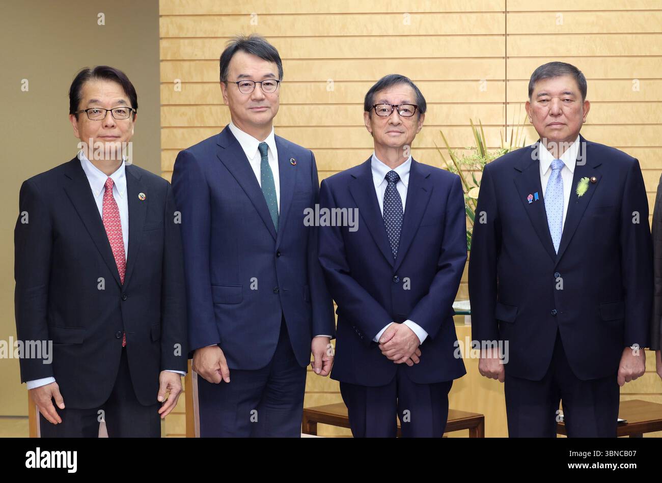 Japanese Prime Minister Shigeru Ishiba (right) meets with Nippon Steel ...
