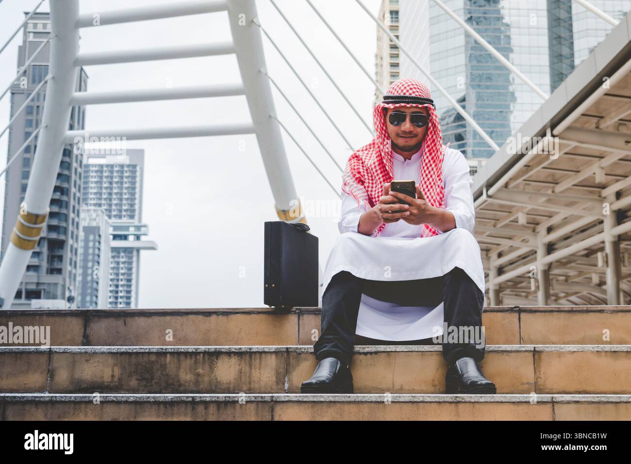 Islamic man using smartphones app organize schedule agenda focus on ...