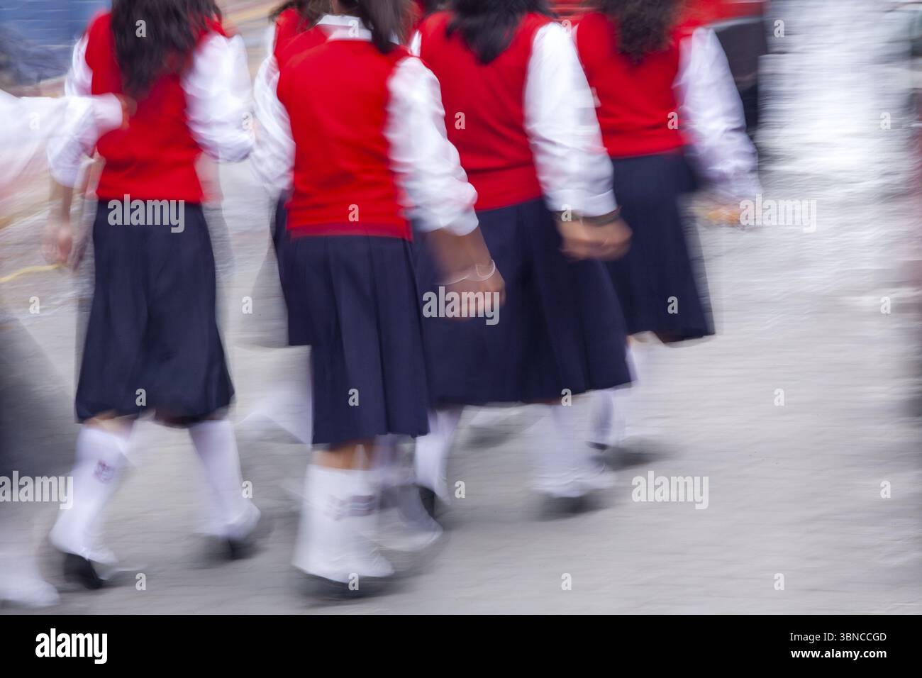 Group of female students walking to the college, Motion blur, City of ...