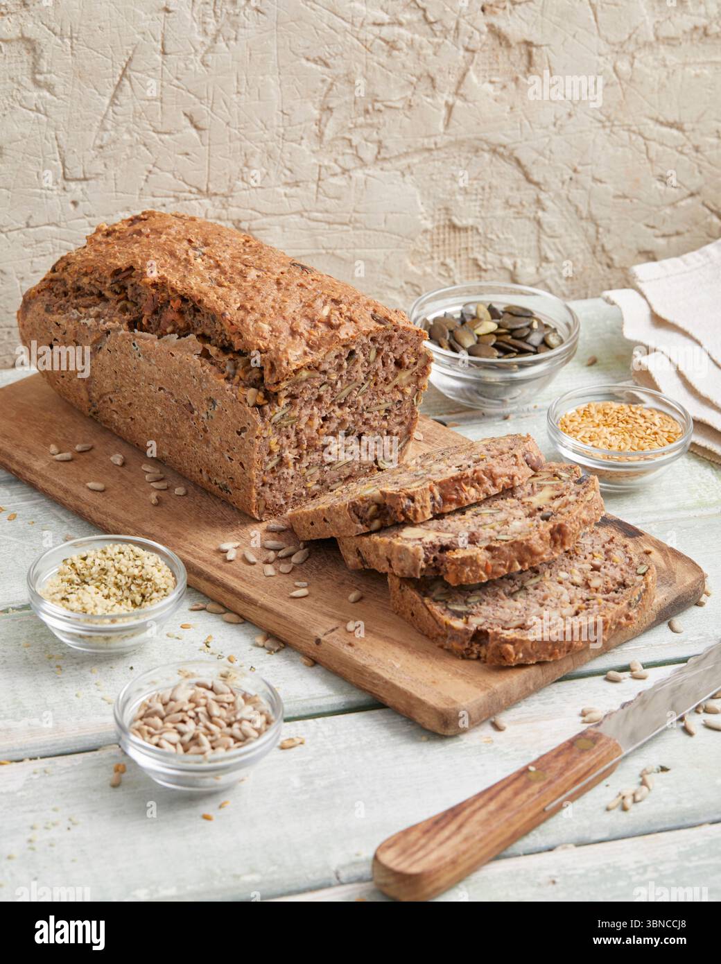 Plant-based protein bread topped with hemp, sunflower and pumpkin seeds ...