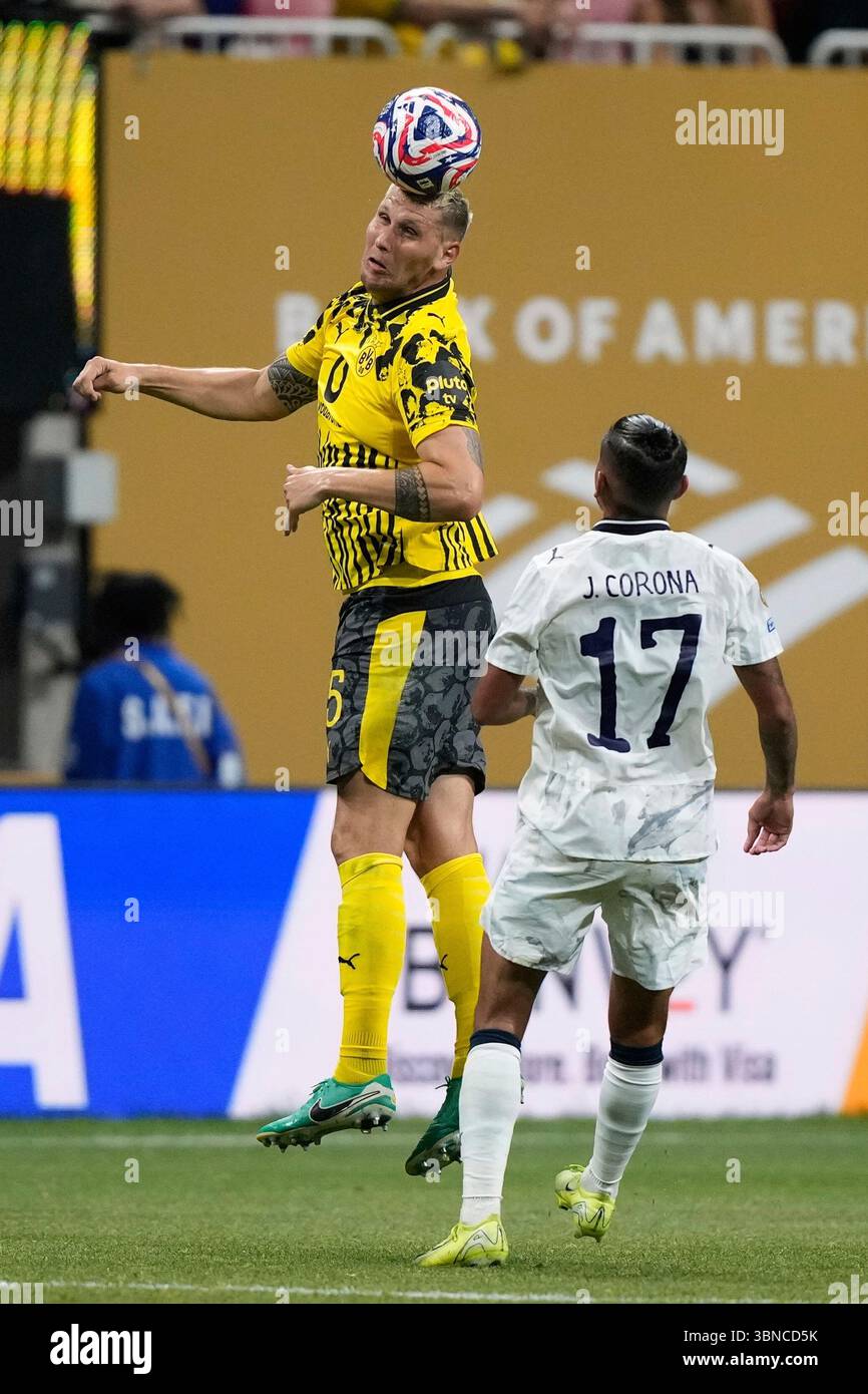Borussia Dortmund's Niklas Sule heads the ball past Monterrey's Jesus ...