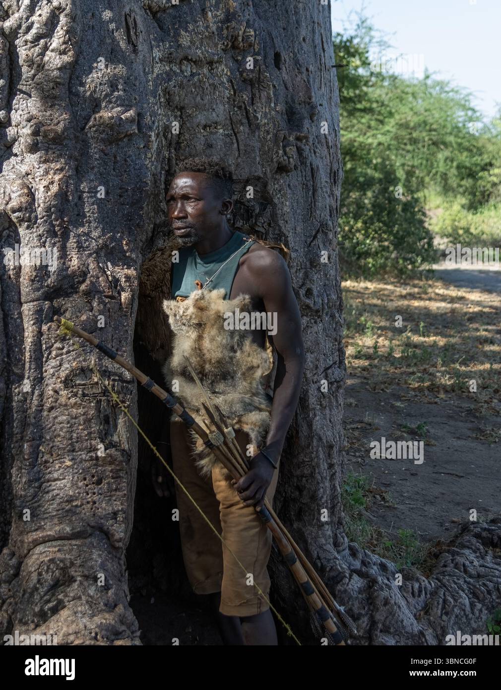Hadza tribe in Tanzania, East Africa. Portrait of tribal hunter in ...