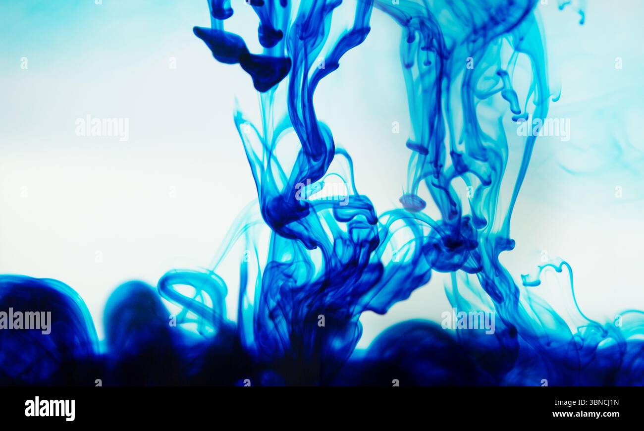 Mixing color ink in water hi-res stock photography and images - Alamy