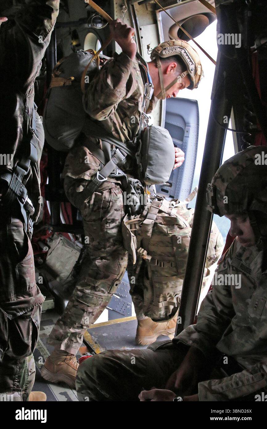 Soldiers assigned to the 1st Special Forces Group (Airborne) prepare to ...