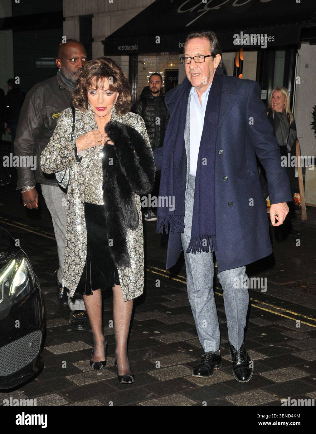 Dame Joan Collins and Percy Gibson at the "Peter Pan" annual panto ...
