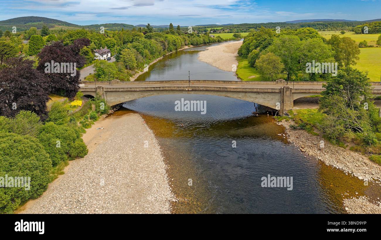 River Dee at Aboyne Aberdeenshire Scotland June 2025 a swimmer and very ...