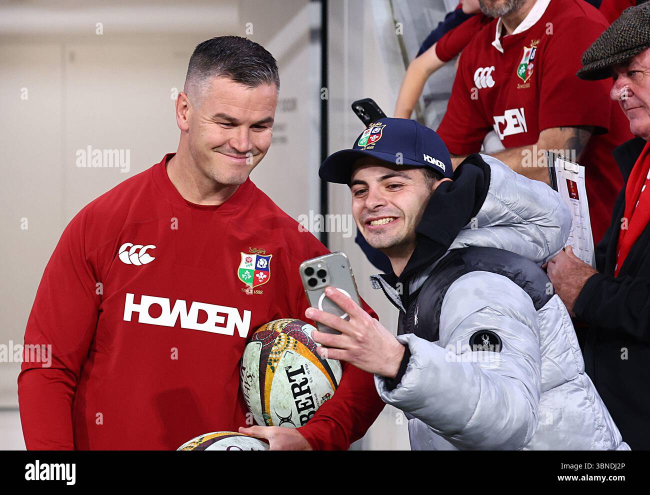 British and Irish Lions skills coach Jonny Sexton with a fan ahead of ...