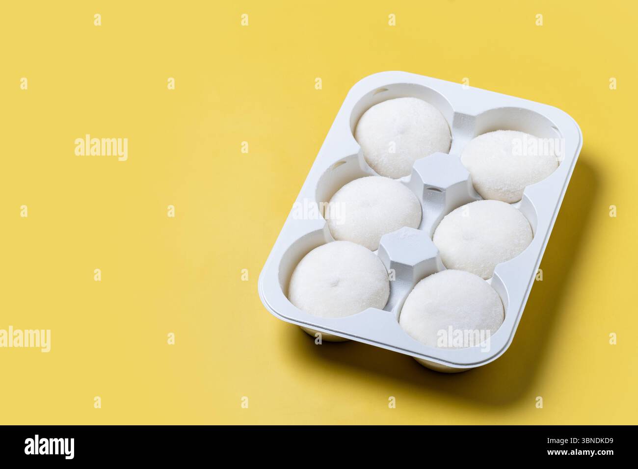 Japanese Coconut ice cream mochi on yellow background Stock Photo - Alamy