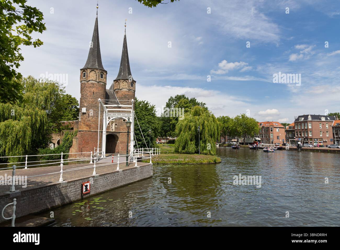 The iconic Oostpoort (Eastern Gate) in Delft, a picturesque medieval ...